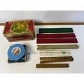 Collection of antique and vintage rulers.