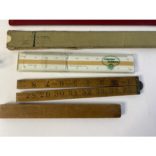 Collection of antique and vintage rulers.