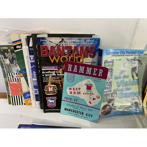 Collection of vintage football programmes, year books and autographs.