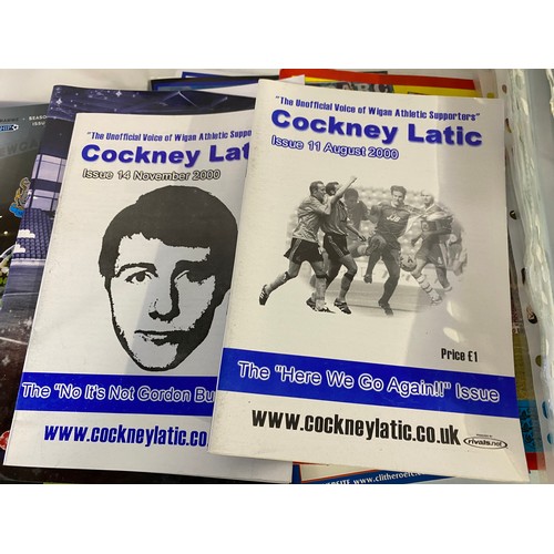 Collection of vintage football programmes, year books and autographs.