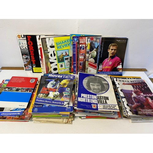 Large selection of old football programmes