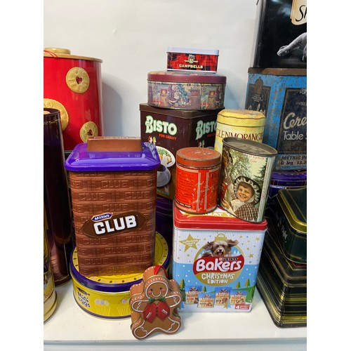 Large collection of metal tins, modern and vintage