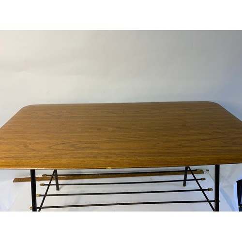Mid century formwood formica coffee table with metal legs and a metal ...