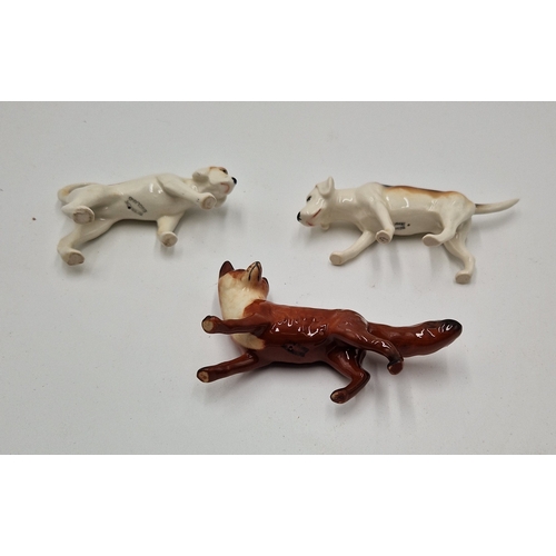 BESWICK MODELS OF TWO HOUNDS AND A FOX