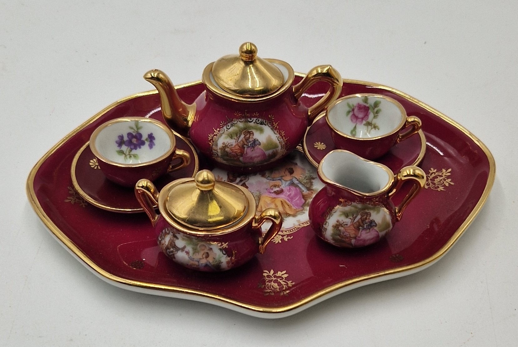 LIMOGE PORCELAIN Miniature TEASET ON TRAY With GILT And FLORAL DECORATION