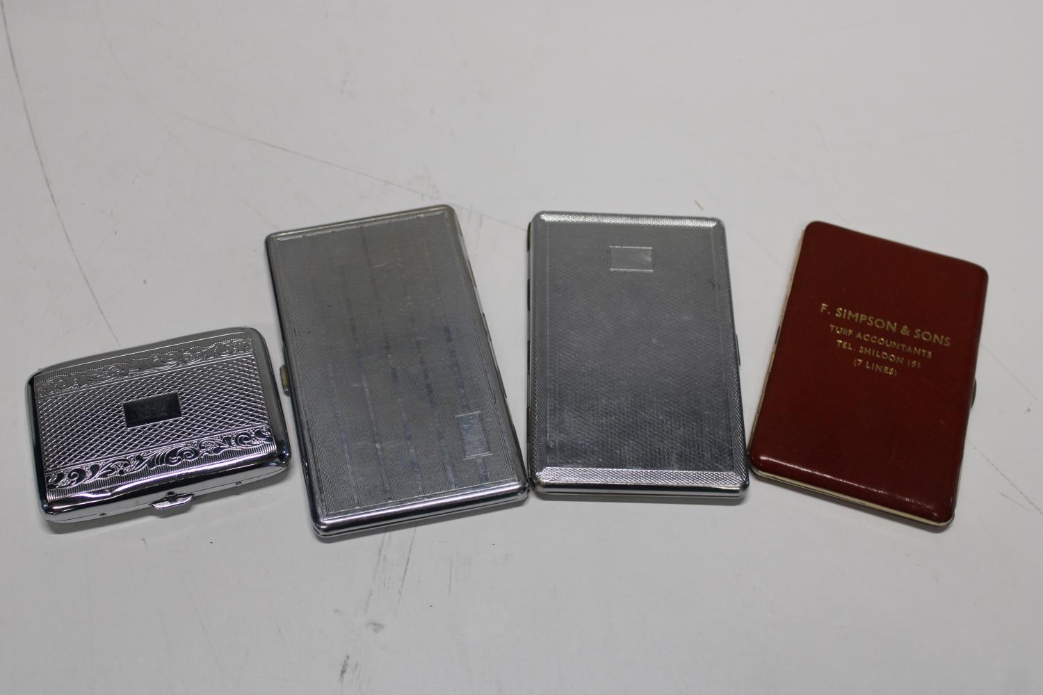 Four vintage cigarette cases