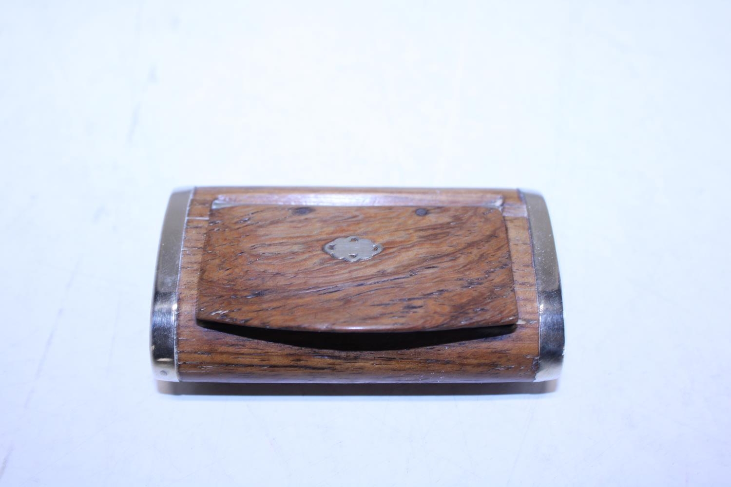 A antique wooden snuff box