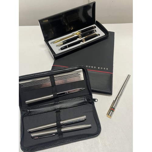 A selection of new pen sets and a Hugo Boss notepad