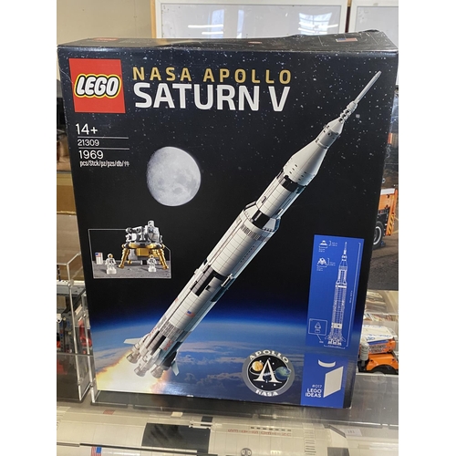 A Lego Nasa Apollo Saturn V model 21309 in display case, with original ...