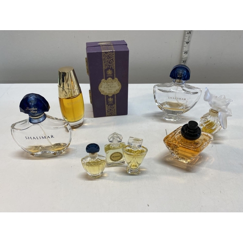 A job lot of assorted perfume bottles (some with contents)