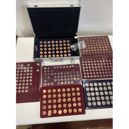 A coin collectors case & contents