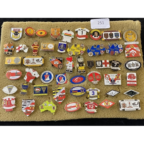 A good selection of assorted rugby league badges