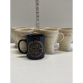 A selection of vintage advertising mugs including Ovaltine, shipping ...