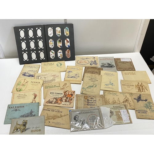 A job lot of assorted vintage cigarette card albums (look to be all ...