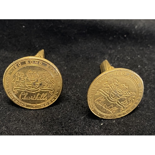 A pair of vintage Churchill club of London cufflinks