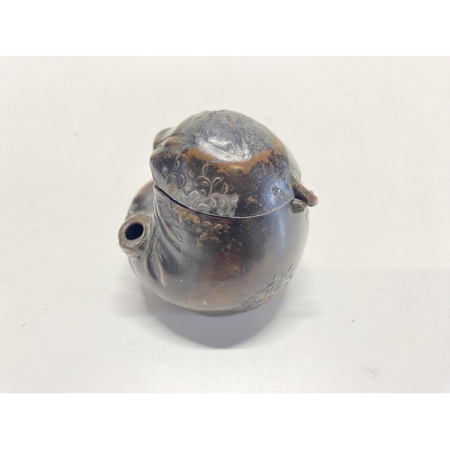 A unusual antique Japanese bronze inkwell with original liner, damage ...