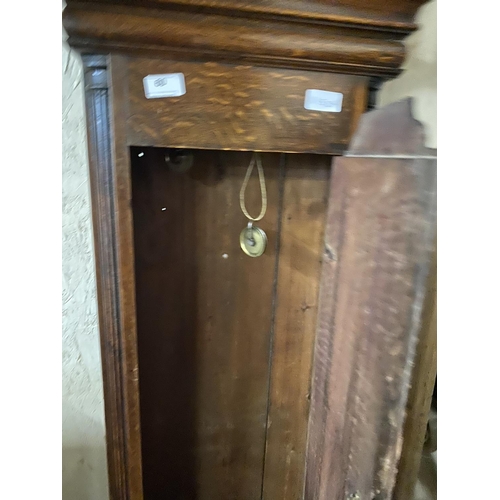 A antique Coats of Wigan long cased clock with brass dial, weights and ...