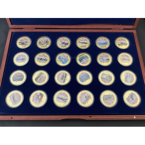 A boxed coin collection of 24 coins commemorating 'The RAF through the ...