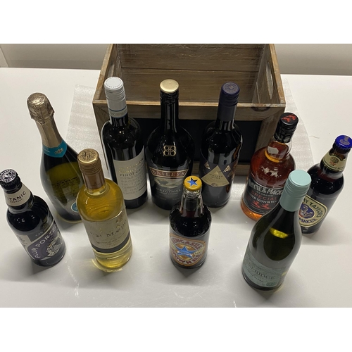 A wooden crate and contents of sealed alcohol including, Whyte Mackay ...