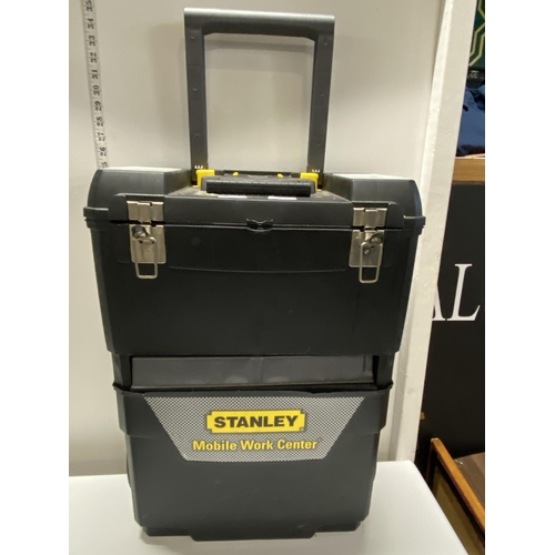 A Stanley mobile work centre with contents of tools etc, shipping ...