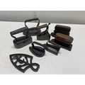 Seven assorted small flat irons, shipping unavailable