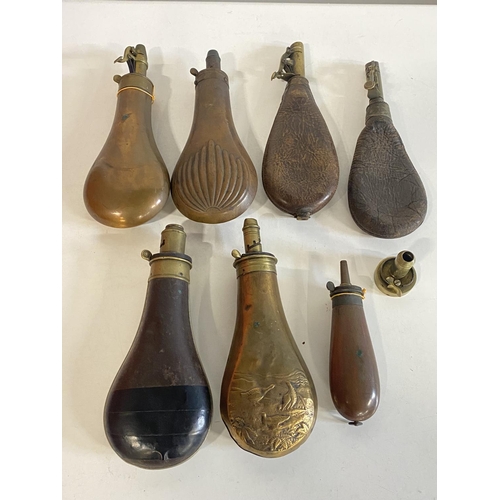 A selection of assorted antique powder flasks, UK shipping only