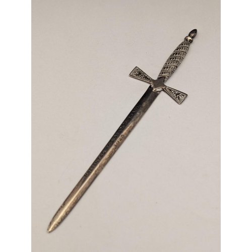A hallmarked silver paper knife with dedication to blade