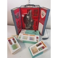 A boxed microscope with assortment of slides and accessories, shipping ...