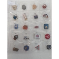 A selection of assorted vintage enamel badges