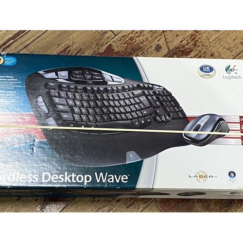 A new boxed Logitech cordless keyboard and mouse (untested)