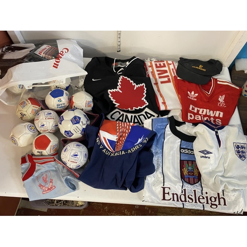 A selection of assorted sports clothing and a large selection of ...