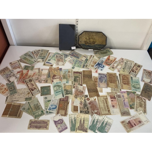A selection of vintage world and British bank notes