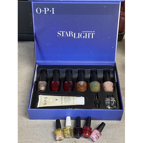 A new cased OPI starlight nail kit with extras