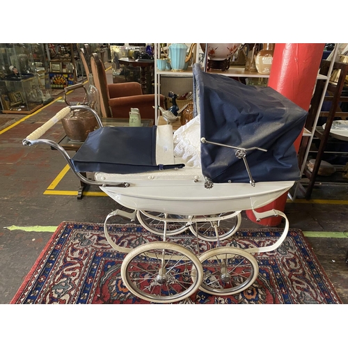 A vintage silver cross pram, shipping unavailable