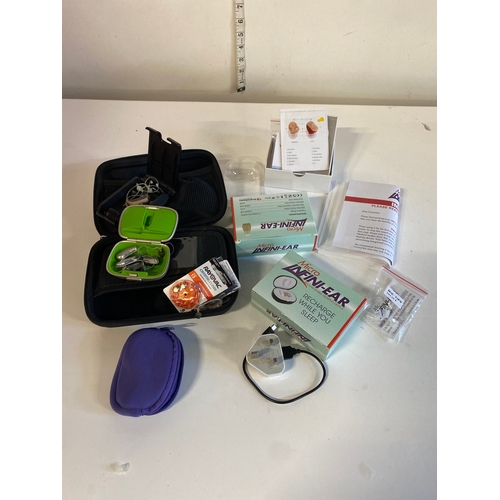 A Collection of Modern Hearing Aids and Accessories, including Branshaw ...