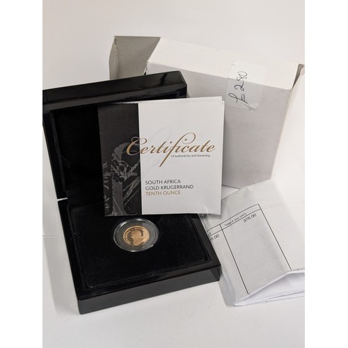 A London Mint 2010 22ct gold 1/10th oz (3.41 grams) Krugerrand. With ...