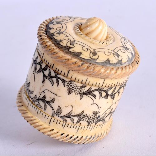 A CARVD BONE TAPE MEASURE. 5cm x 3.8cm weight 41.9g