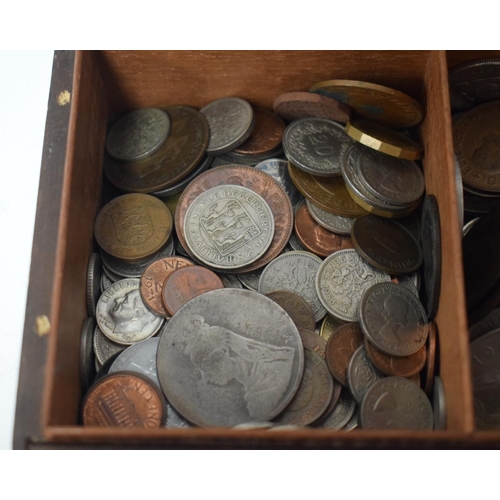 A BOX OF COINS. (qty)