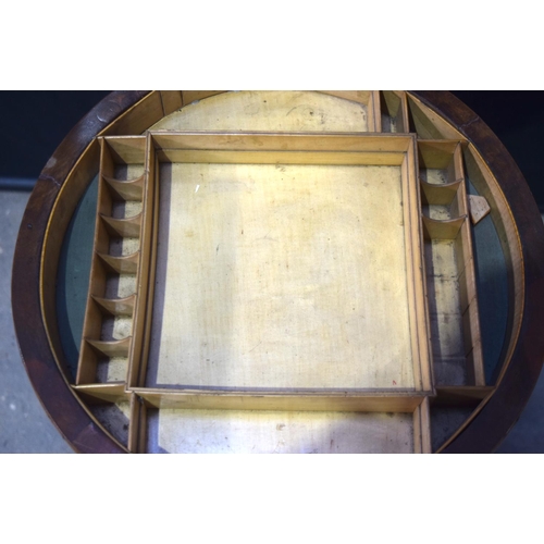 A Victorian Walnut veneered work box on a carved wood stand on castors ...