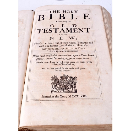 A bronze mounted leather bound family Bible printed 1708 42 x 77 cm