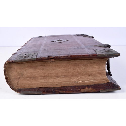 A bronze mounted leather bound family Bible printed 1708 42 x 77 cm