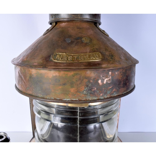 An antique ships masthead light 58 x 32 cm.