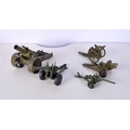 A collection of Die cast metal model cannons Dinky, Britain's, Crescent ...