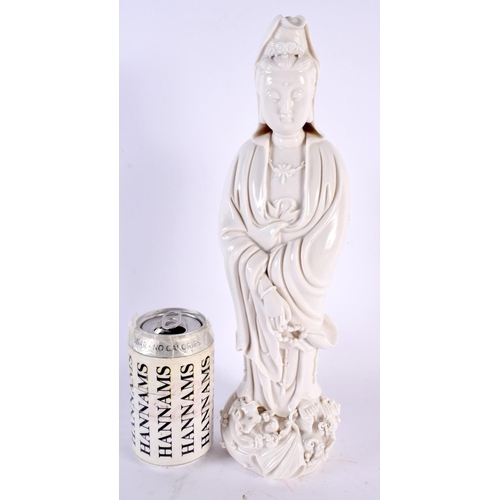 A 19TH CENTURY CHINESE BLANC DE CHINE DEHUA PORCELAIN FIGURE OF AN ...