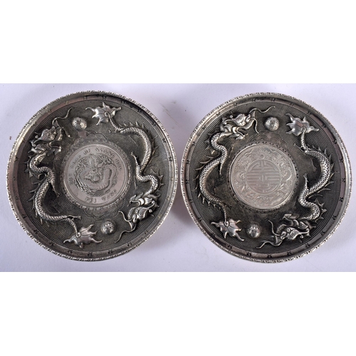 A Pair of Chinese Coin Dishes. 10.1cm x 1.1cm, total weight 202.3g (2)
