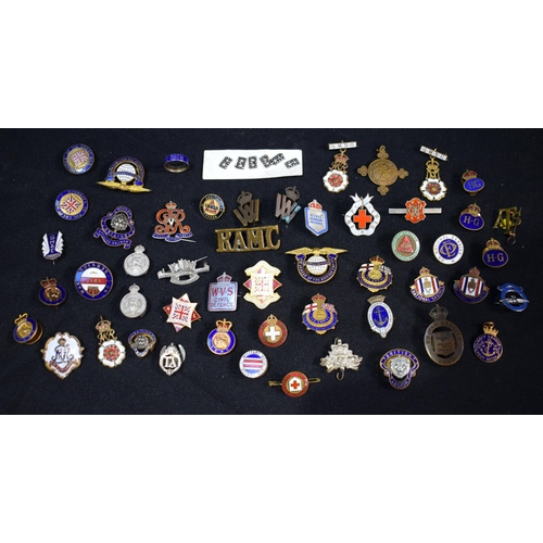 A collection of enamelled badges some military (Qty).
