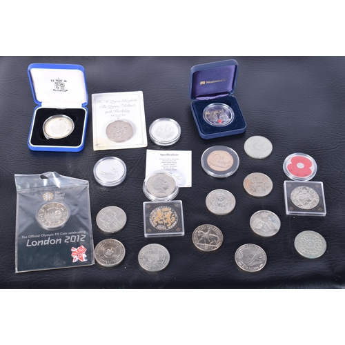 A Collection of Royal Mint commemorative £5 coins