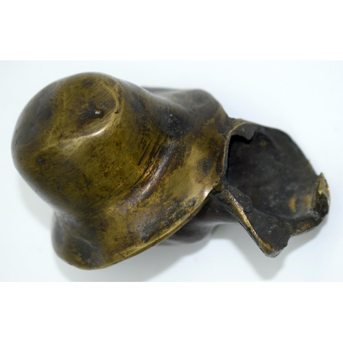 A small 19th Century bronze head of a young boy 11cm.