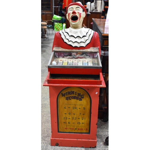 A CHARMING ANTIQUE CLOWN CARNIVAL THROWING GAME from the Goose Fair ...