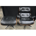 An Eames style arm chair and matching footstool. 76 x 84cm. (2)